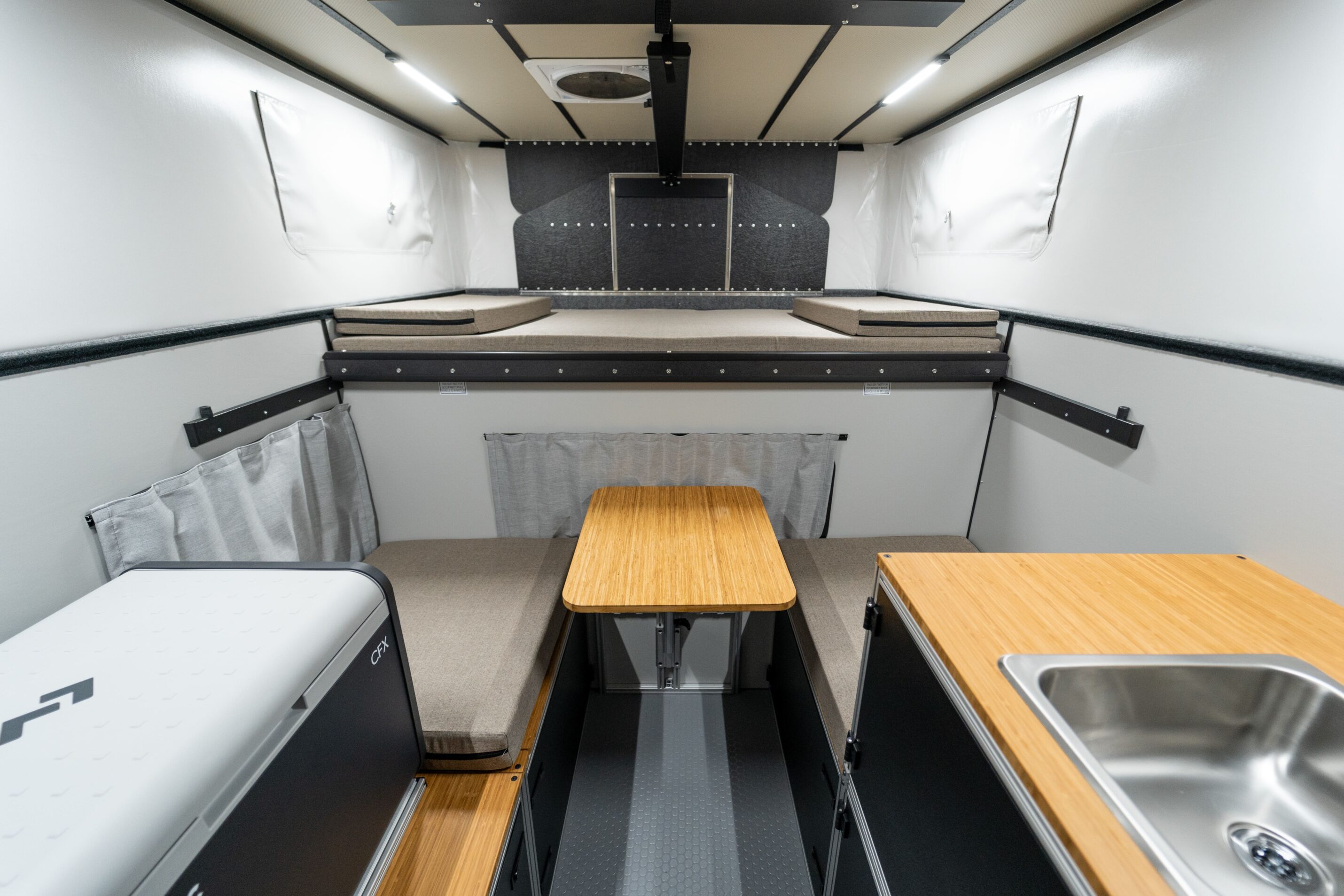 The CampOut Series of Slide-In Pop Up Truck Campers
